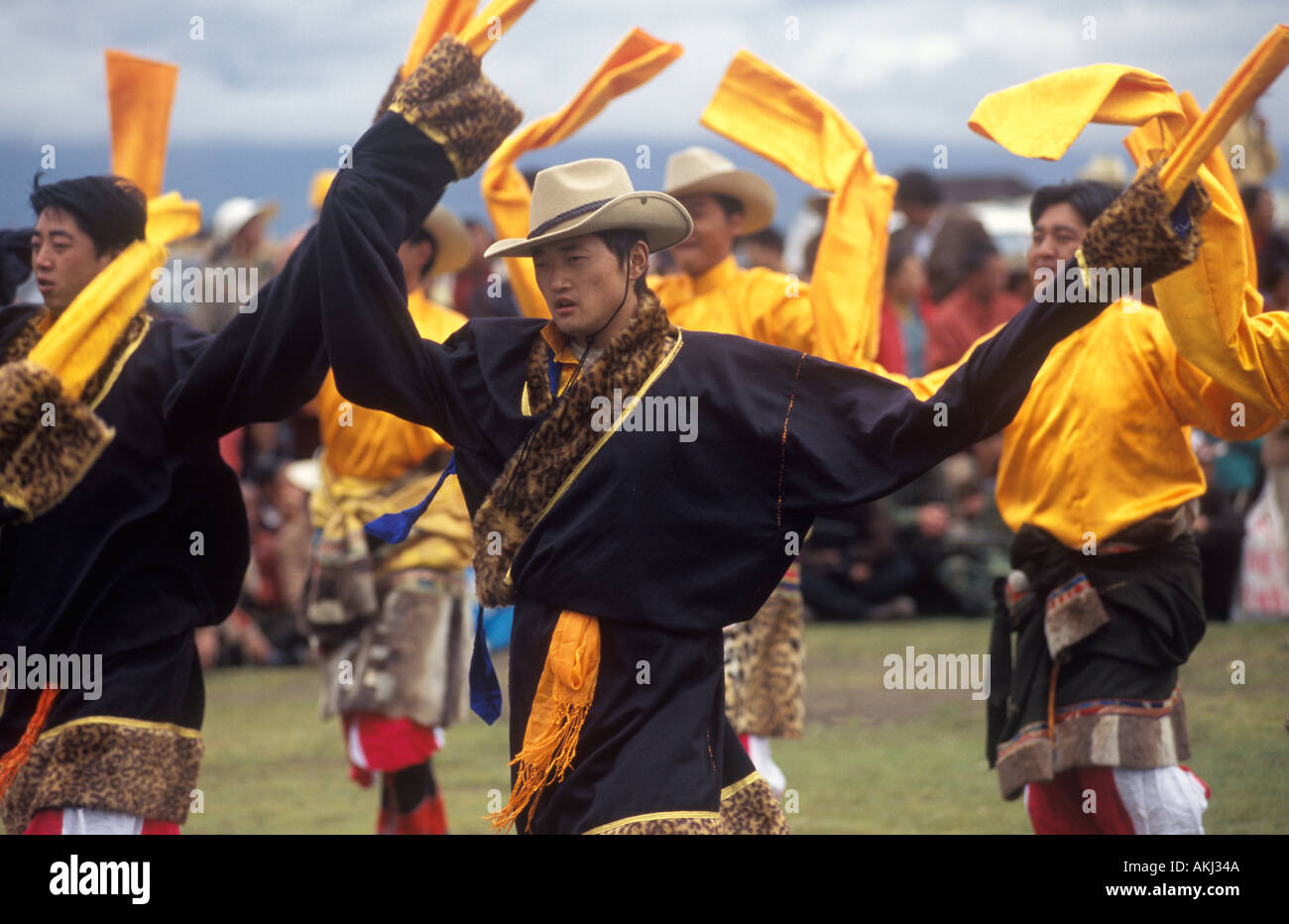 Dance troop with otter skin costumes represent a region of Kham Litang ...