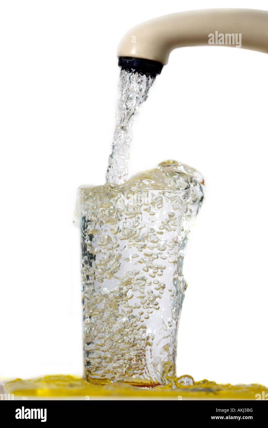 Filling a glass of water from a tap Stock Photo - Alamy