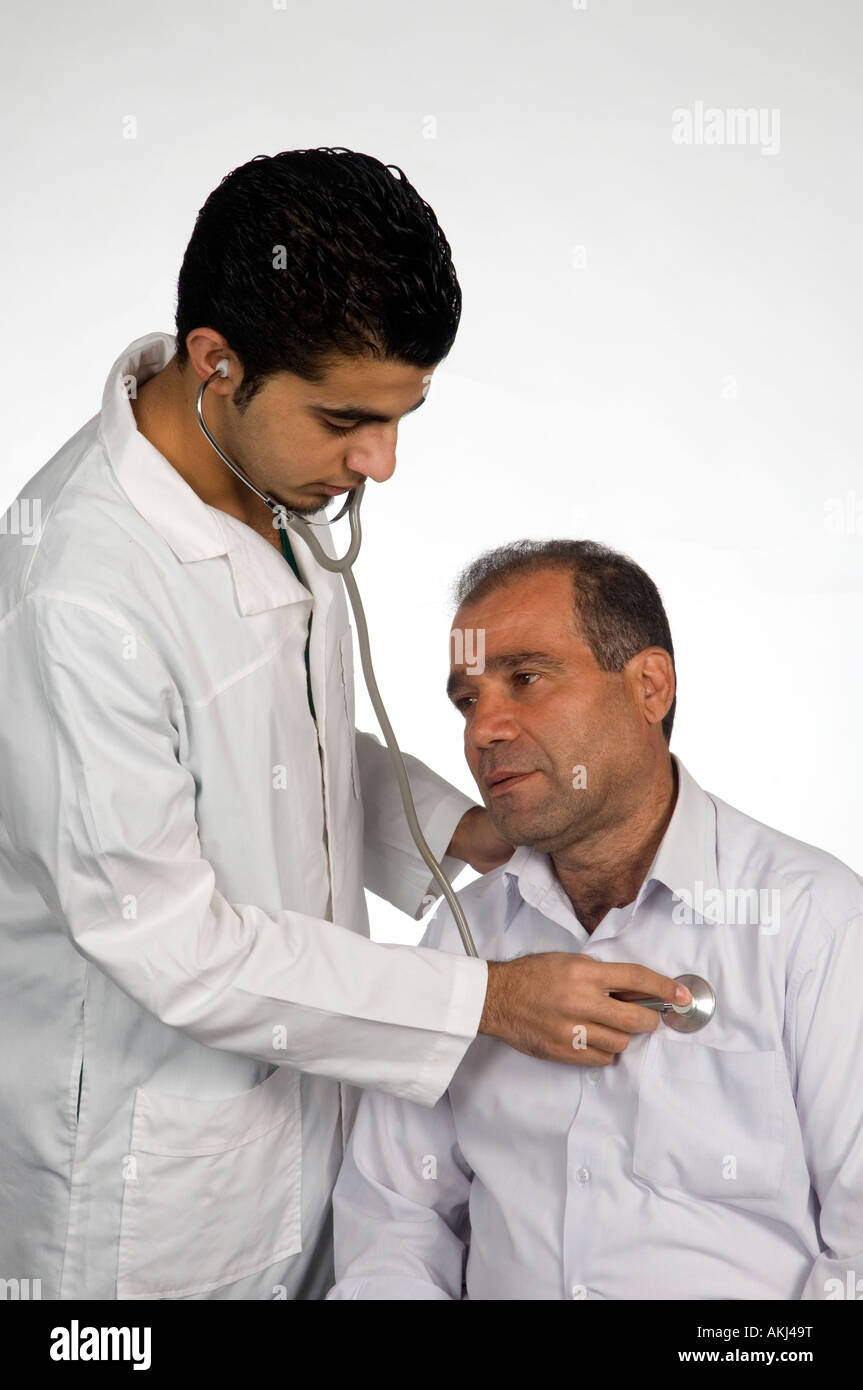 Doctor checking patient heartbeat Stock Photo - Alamy