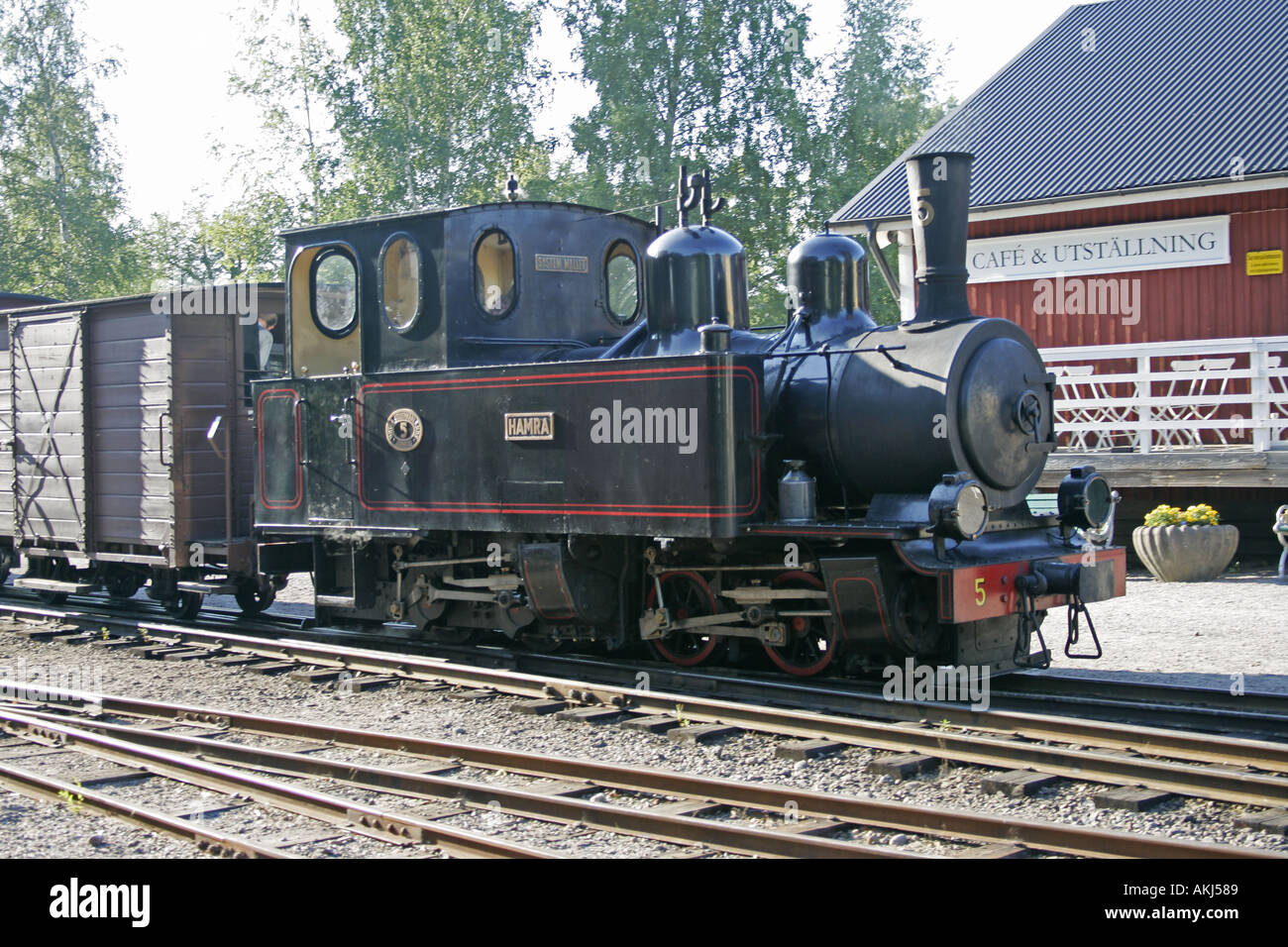 Historic engine with trailer Stock Photo - Alamy