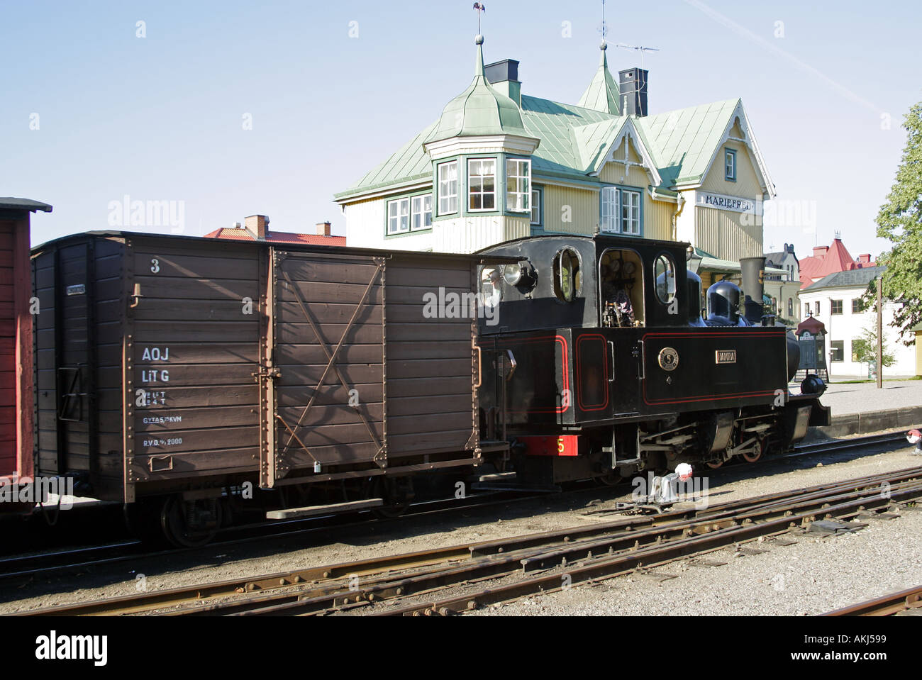 Historic engine with trailer Stock Photo - Alamy