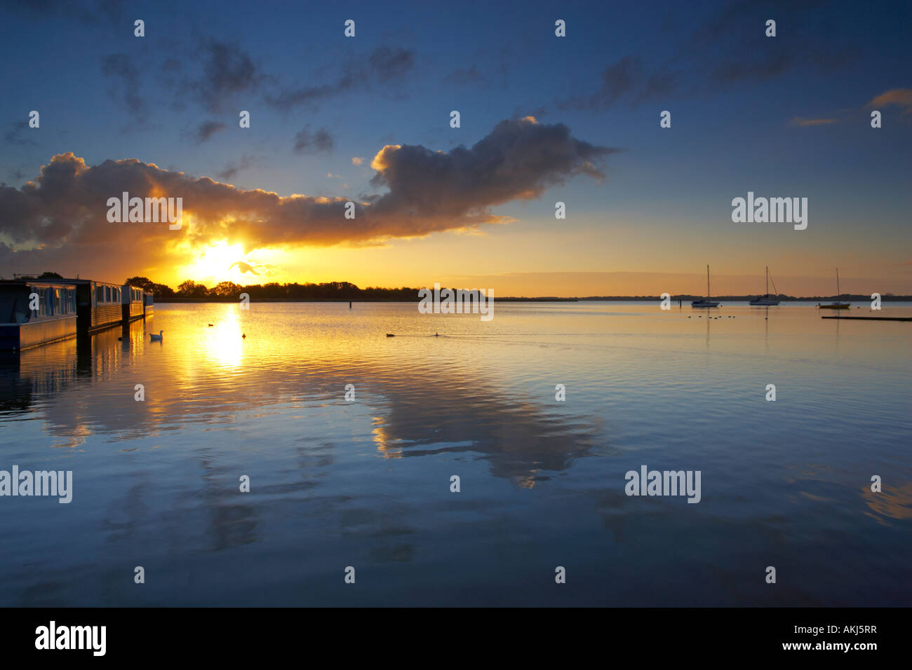 Hickling Broad the largest of the Norfolk Broads at sunrise Stock Photo ...