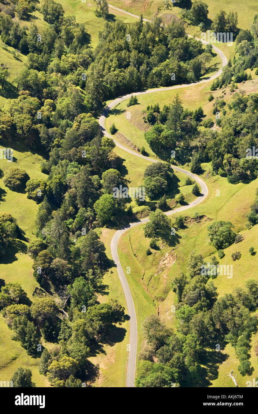 Aerial of road curving through rural landscape USA Stock Photo - Alamy