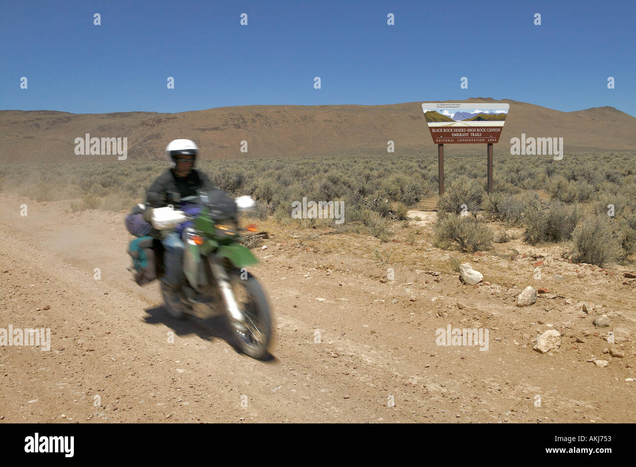 Motorcyclist riding the back roads of Nevada USA Stock Photo - Alamy