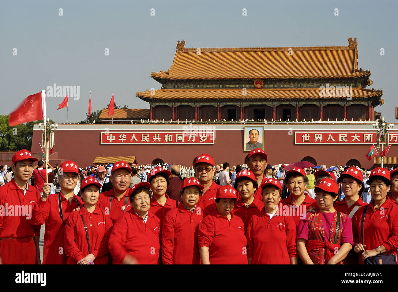 Red group at Tiananmen Square Beijing China Stock Photo - Alamy