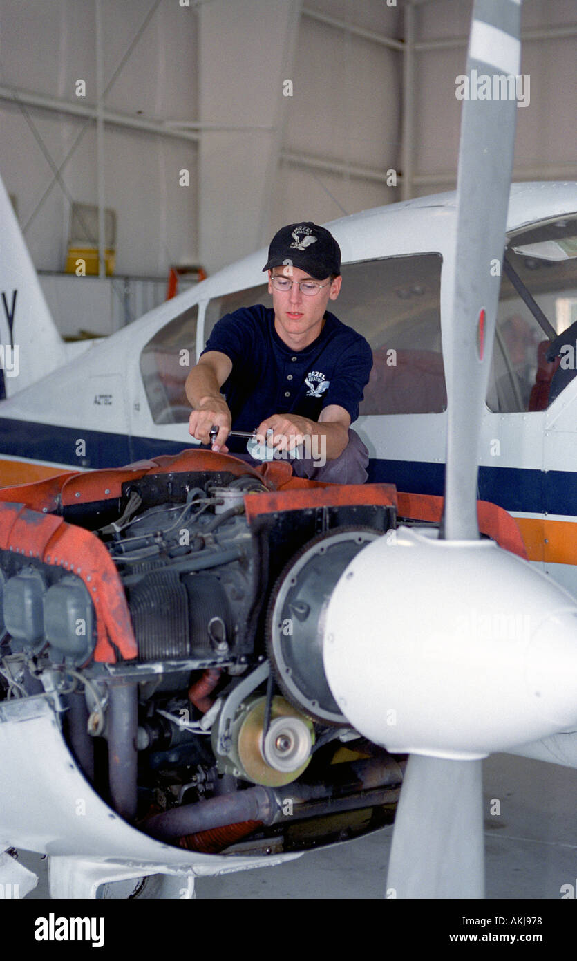 Airline mechanic works on twin hi-res stock photography and images - Alamy