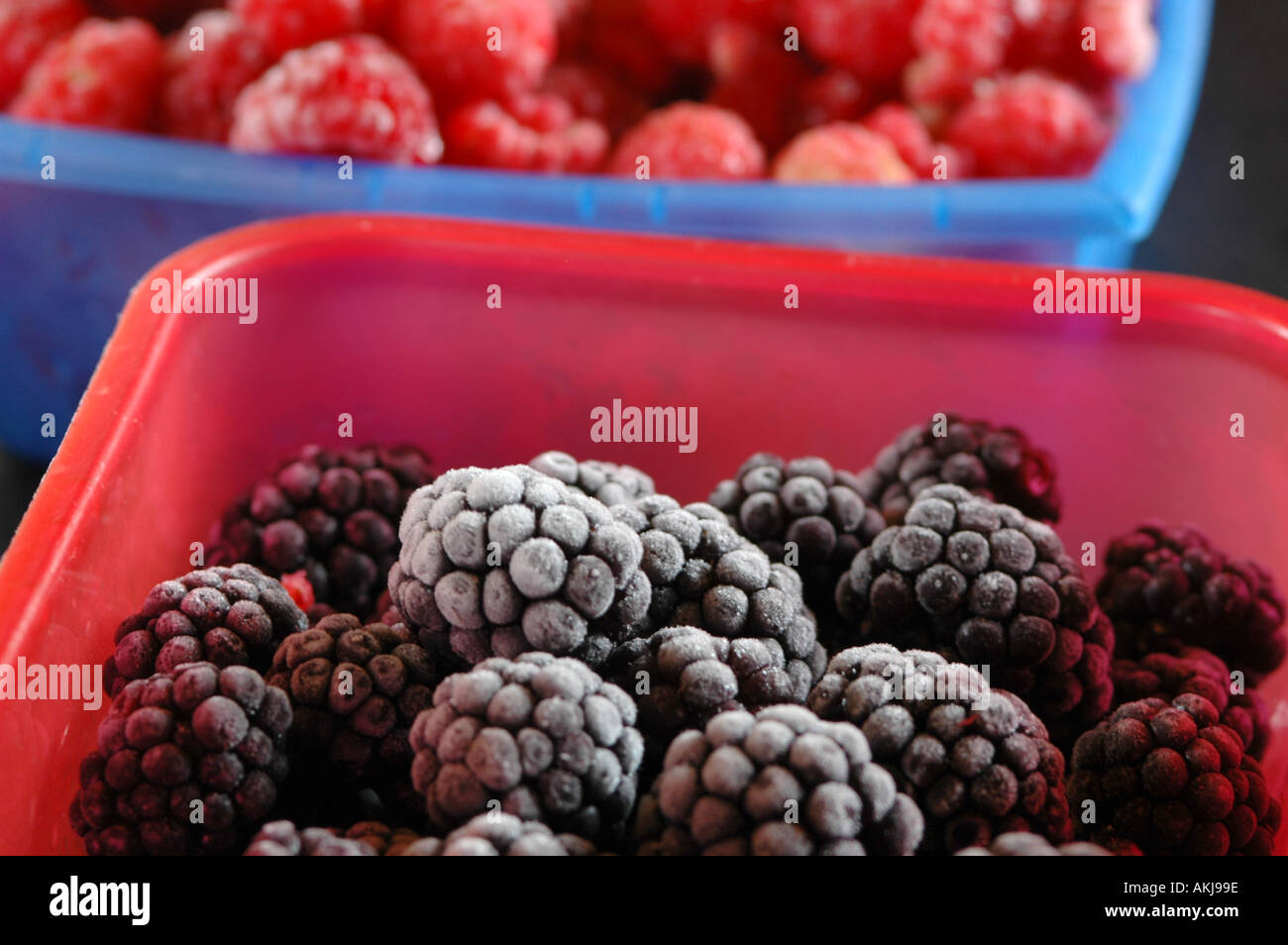 Frozen blackberries on color hi-res stock photography and images - Alamy