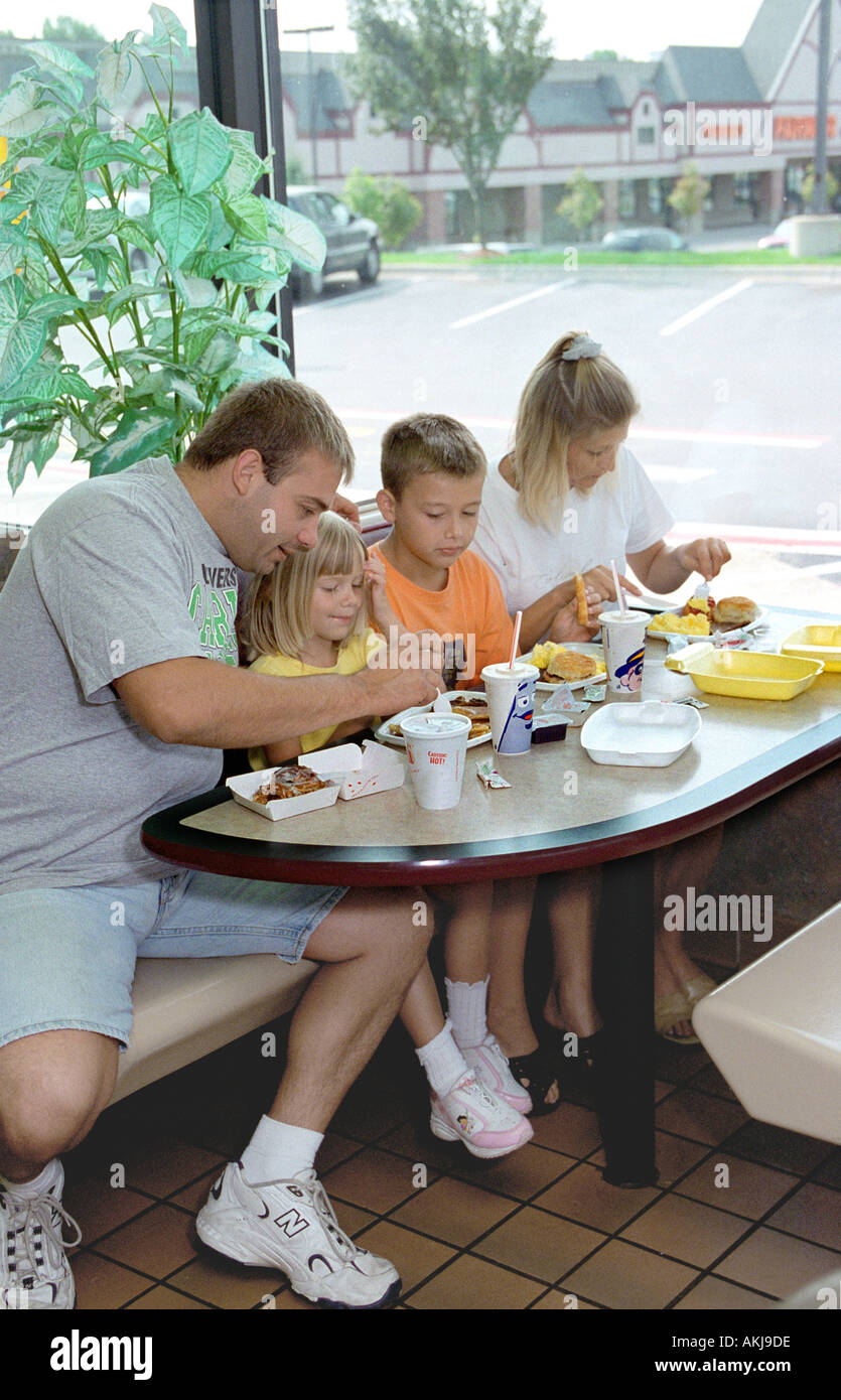 Family Eating At Fast Food Restaurant