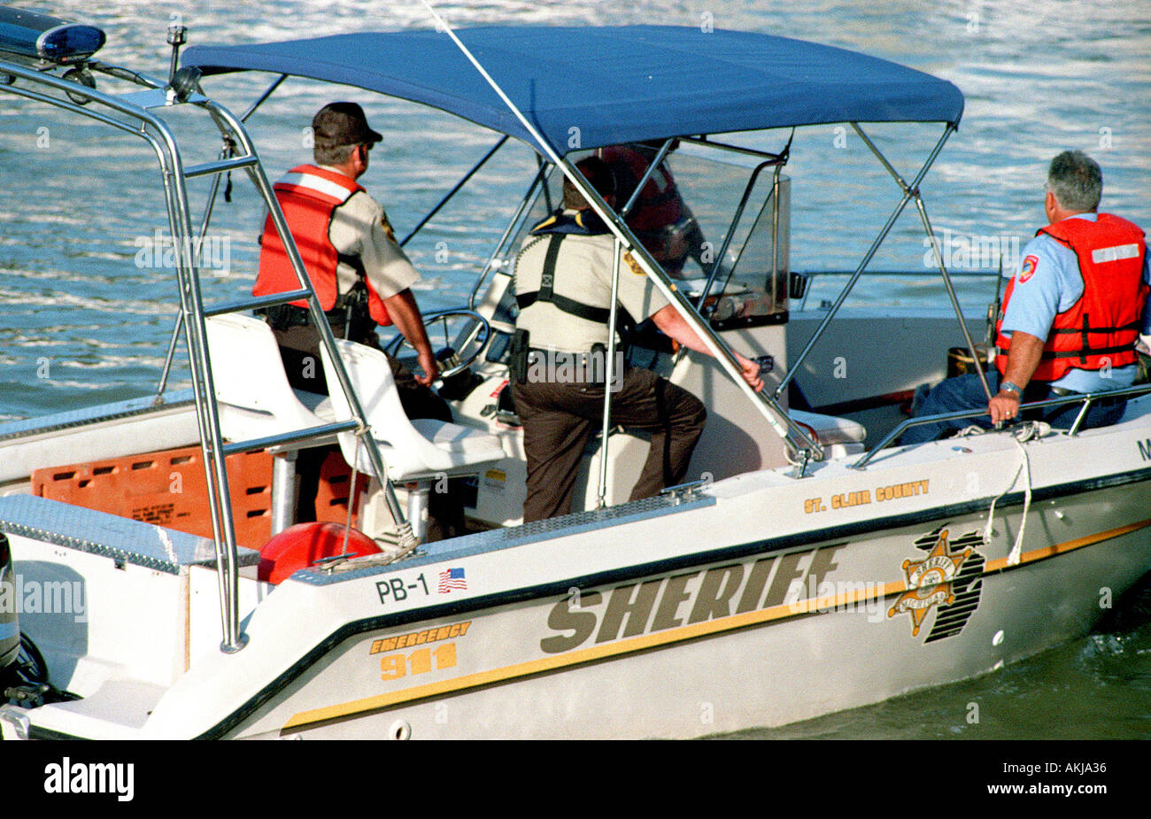Sheriff boat patrols the St Clair River bordering Canada and Michigan ...