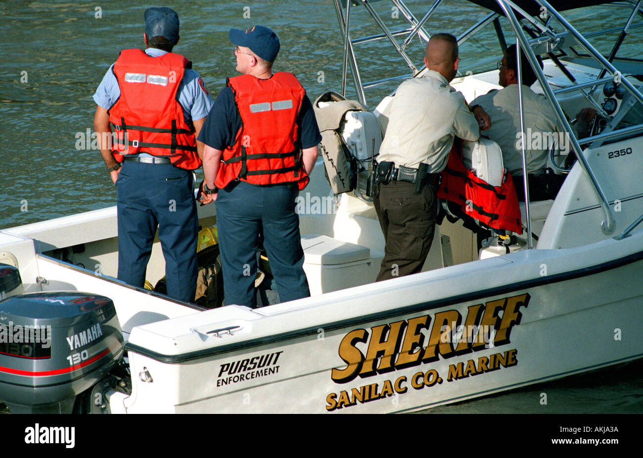 Sheriff boat patrols the St Clair River bordering Canada and Michigan ...