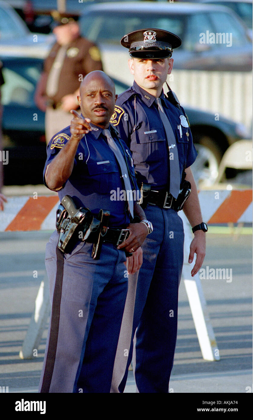 Police monitor crowd control during a large festival event in Port ...