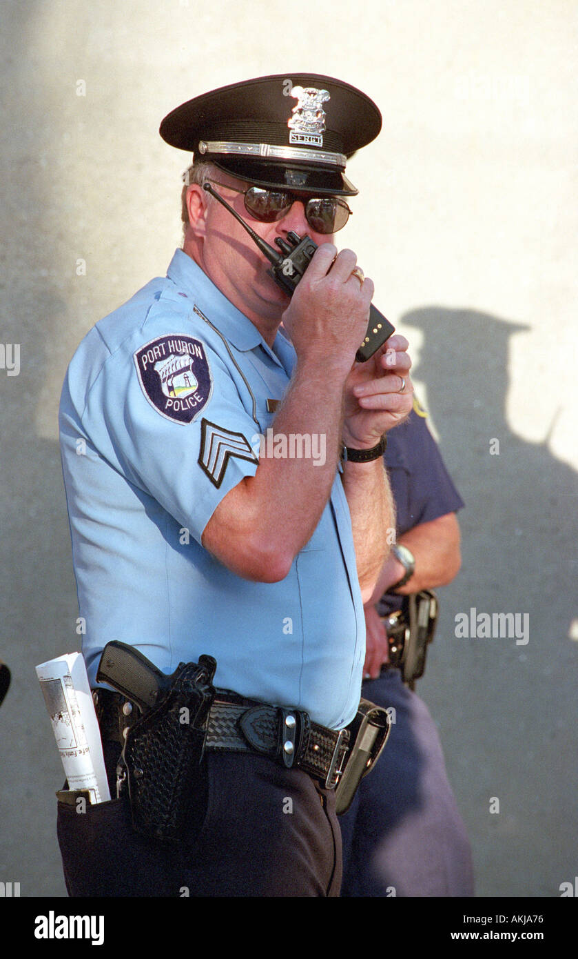 Police monitor crowd control during a large festival event in Port ...