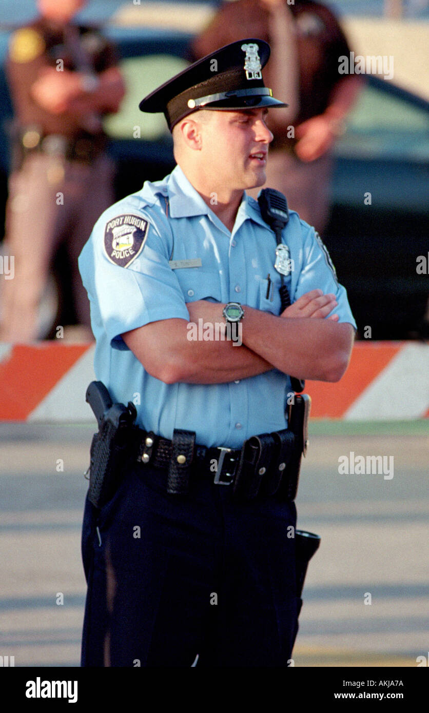 Police monitor crowd control during a large festival event in Port ...