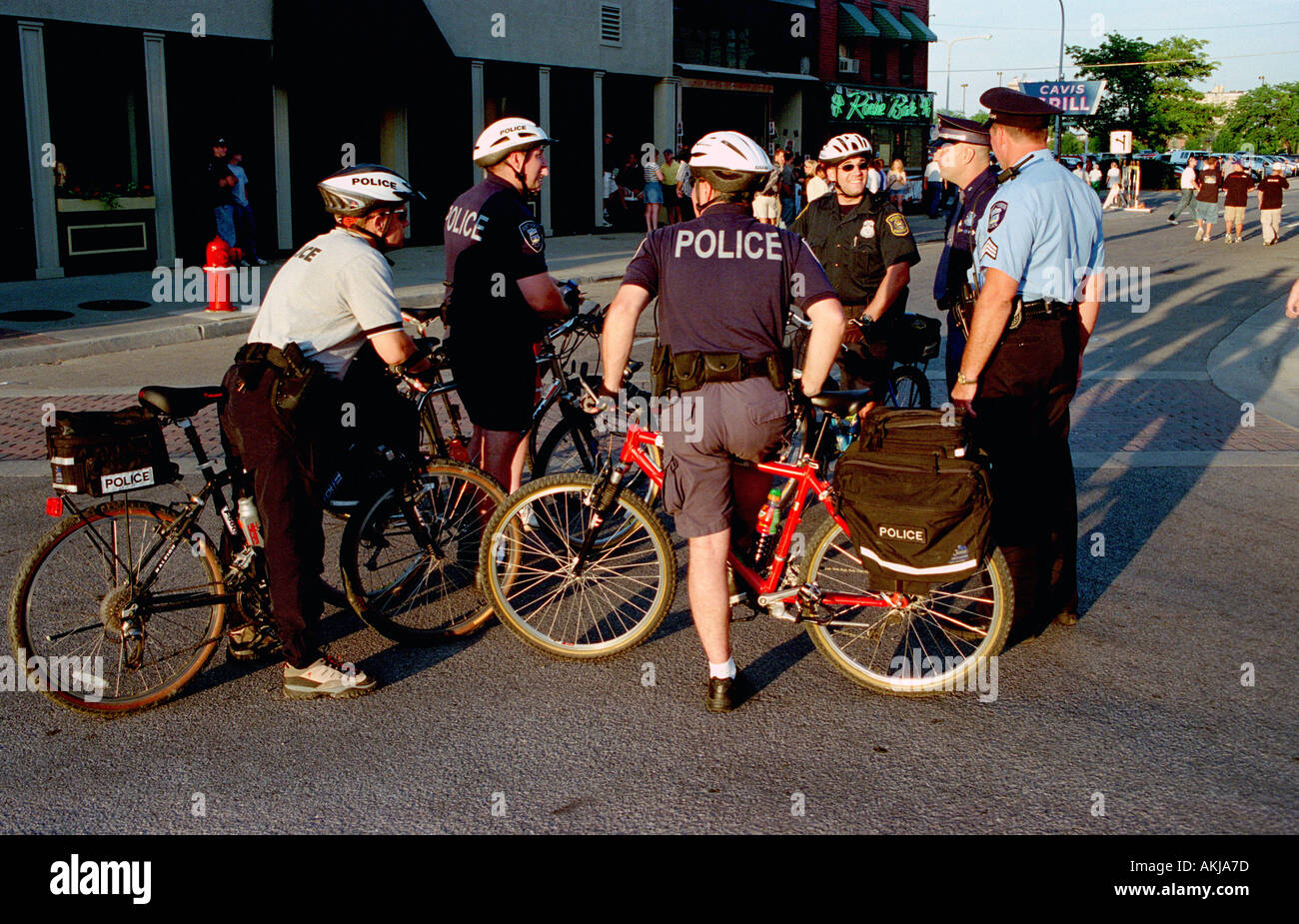 Police monitor crowd control during a large festival event in Port ...