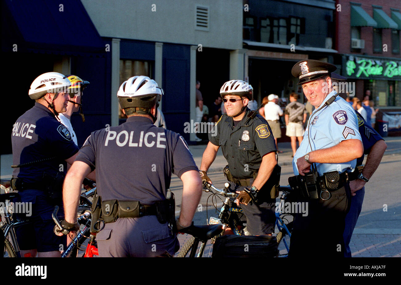 Police monitor crowd control during a large festival event in Port ...