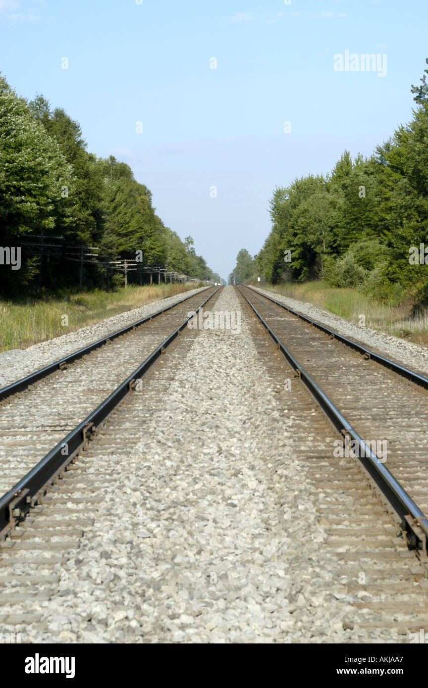 A double set of railroad tracks lead to infinity Stock Photo - Alamy