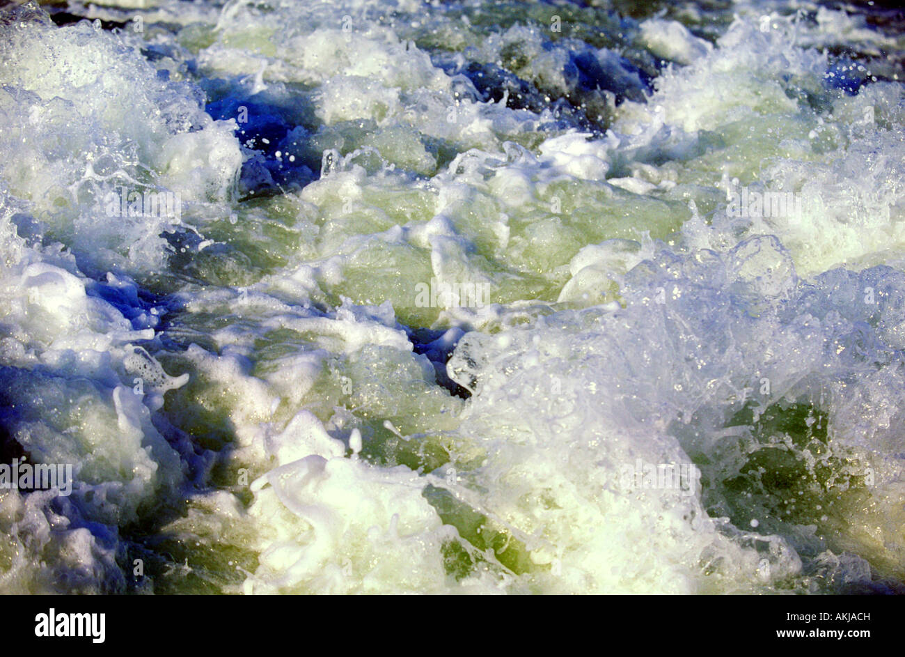 Churning white water Stock Photo - Alamy