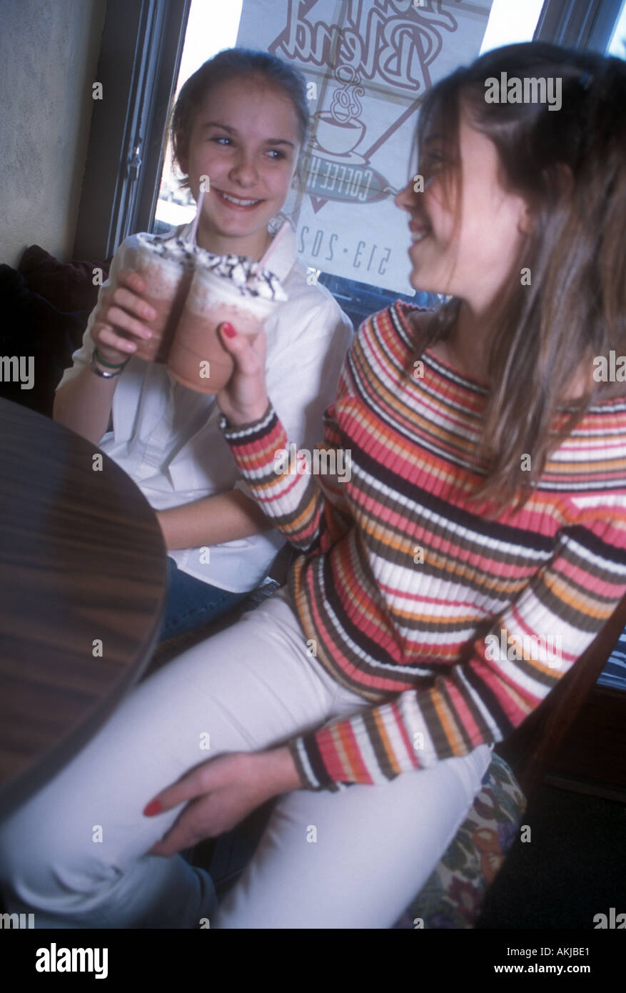 Teenagers hanging out in cafe hi-res stock photography and images - Alamy
