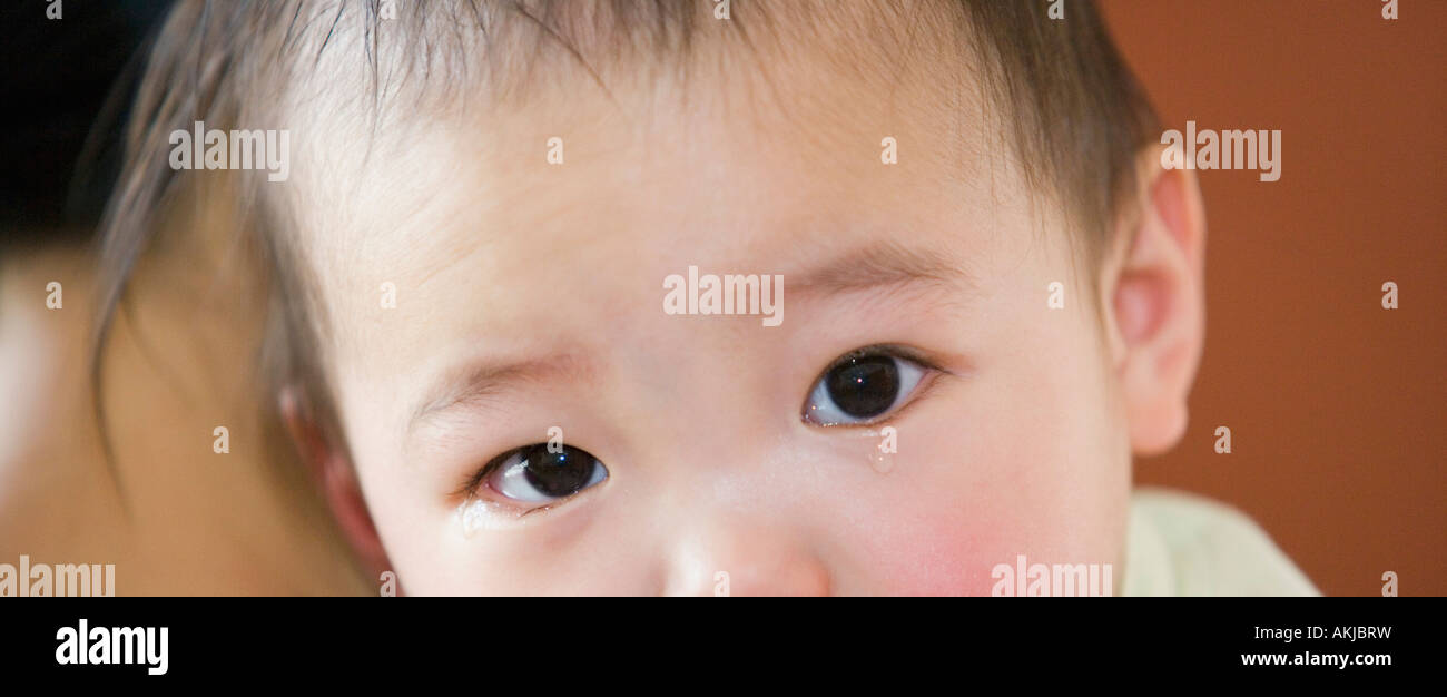 Asian baby crying Stock Photo - Alamy