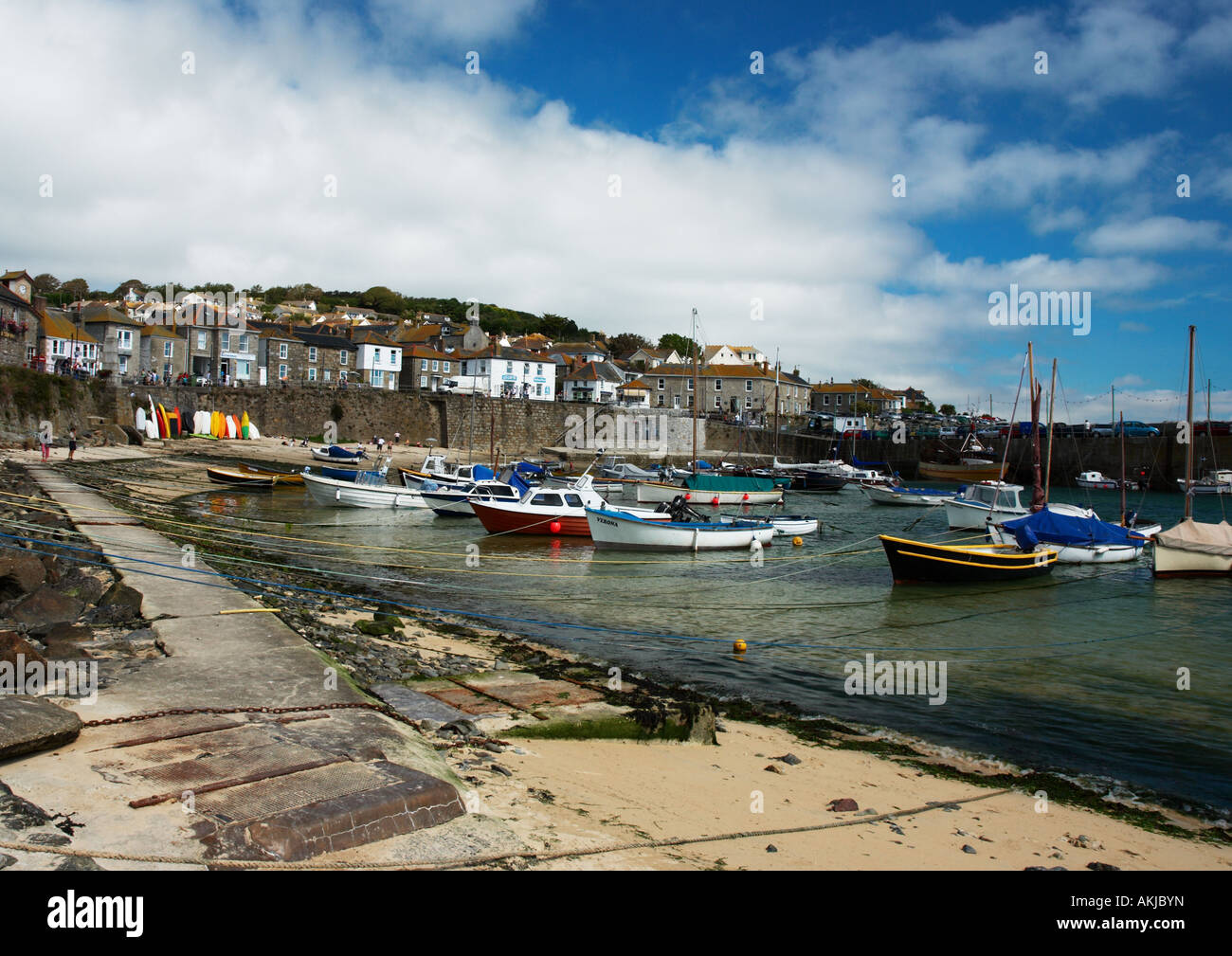The picturesque and pretty fishing village of Mousehole in Cornwall ...