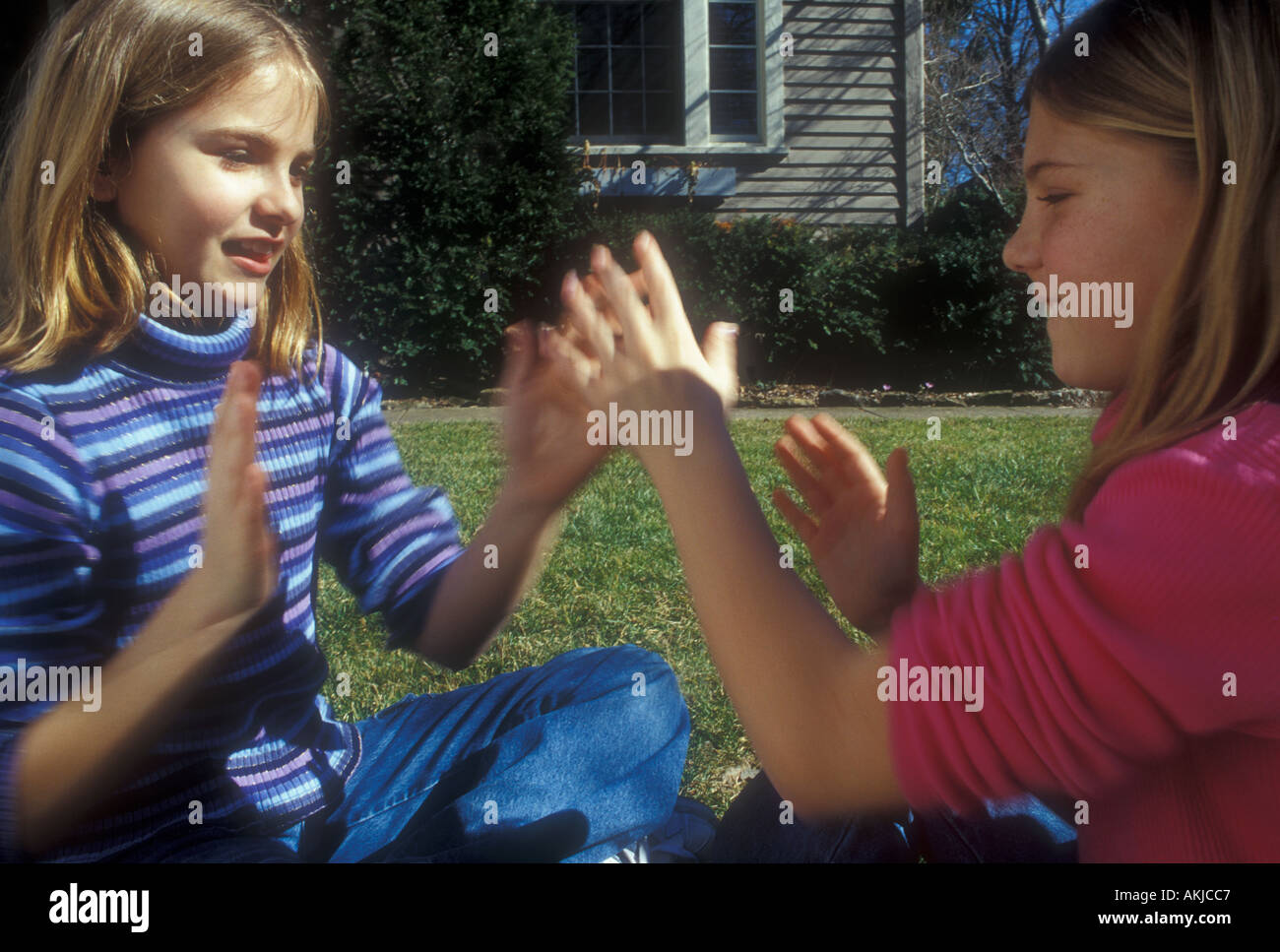 Young Girls Playing Stock Photo - Alamy