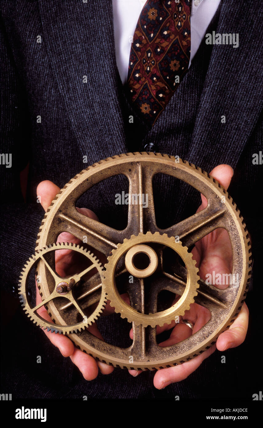 Man holding flywheel in hands hi-res stock photography and images - Alamy