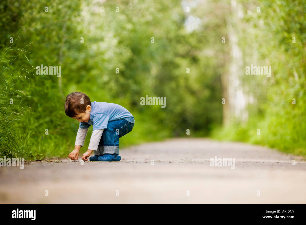 Boy bent over hi-res stock photography and images - Alamy