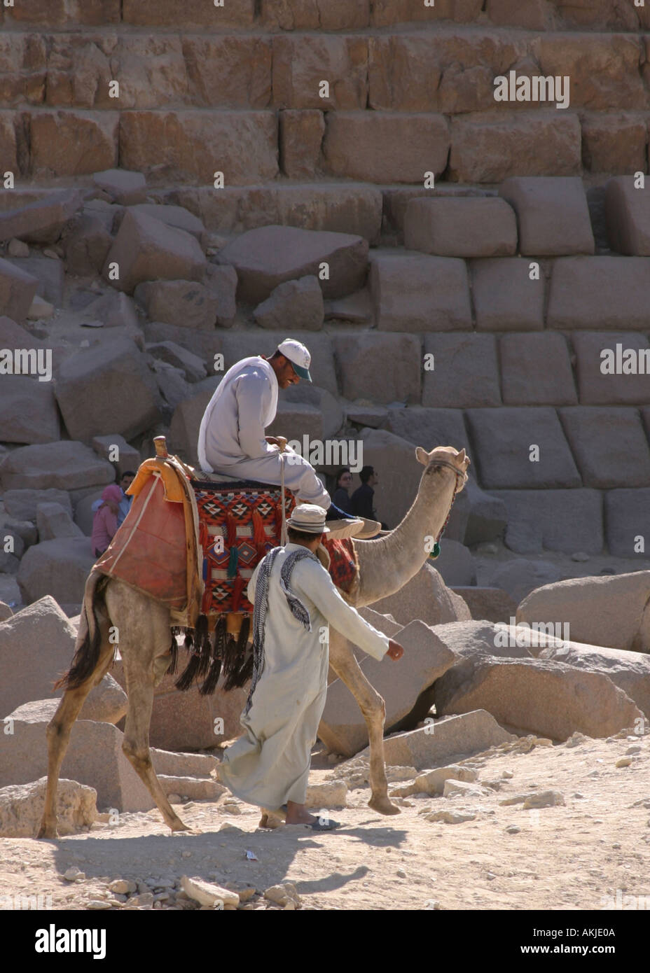 Men on camel pyramid hi-res stock photography and images - Alamy