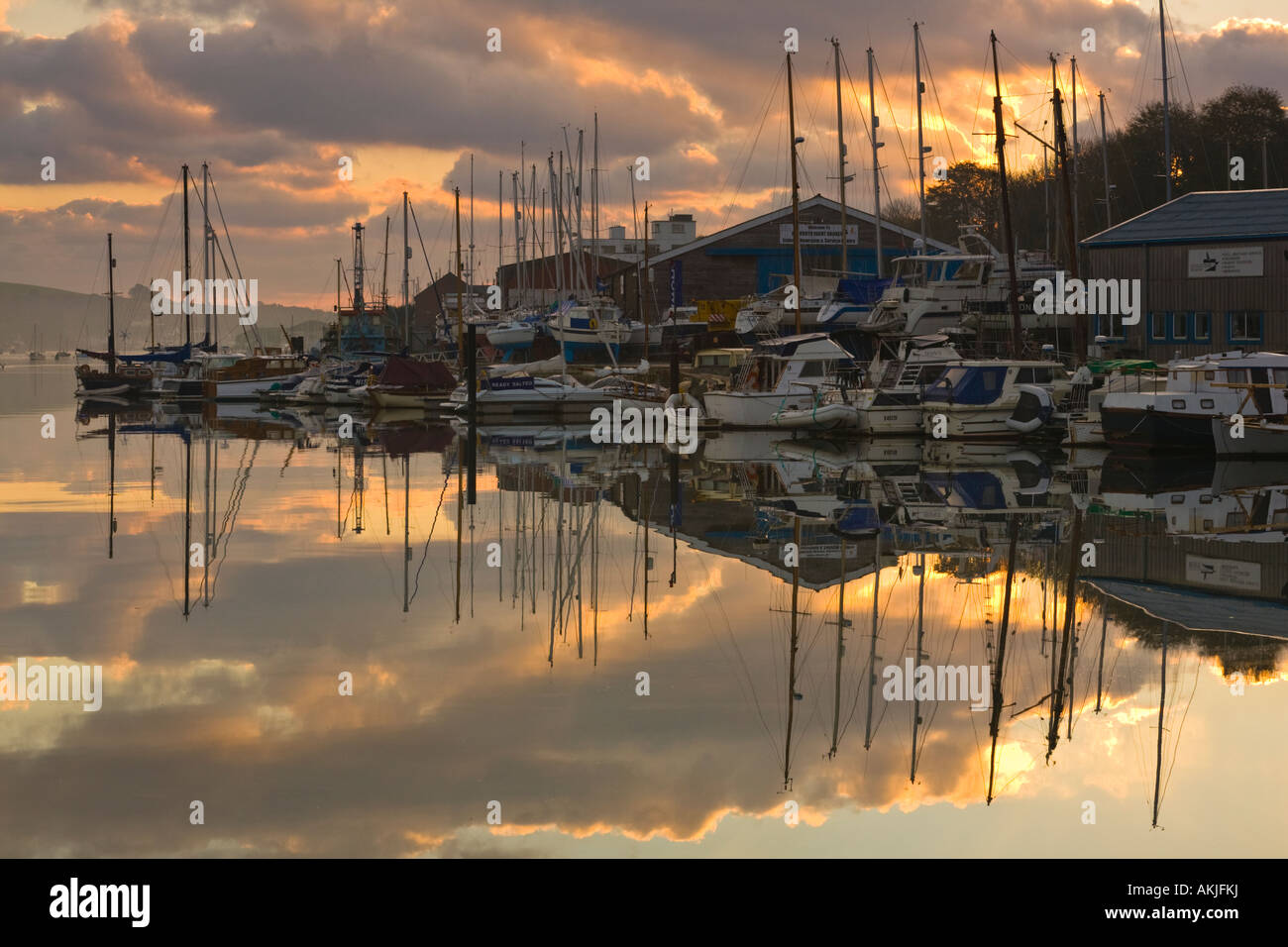 Sunrise reflections and a Marina at Penryn Cornwall England Stock Photo ...