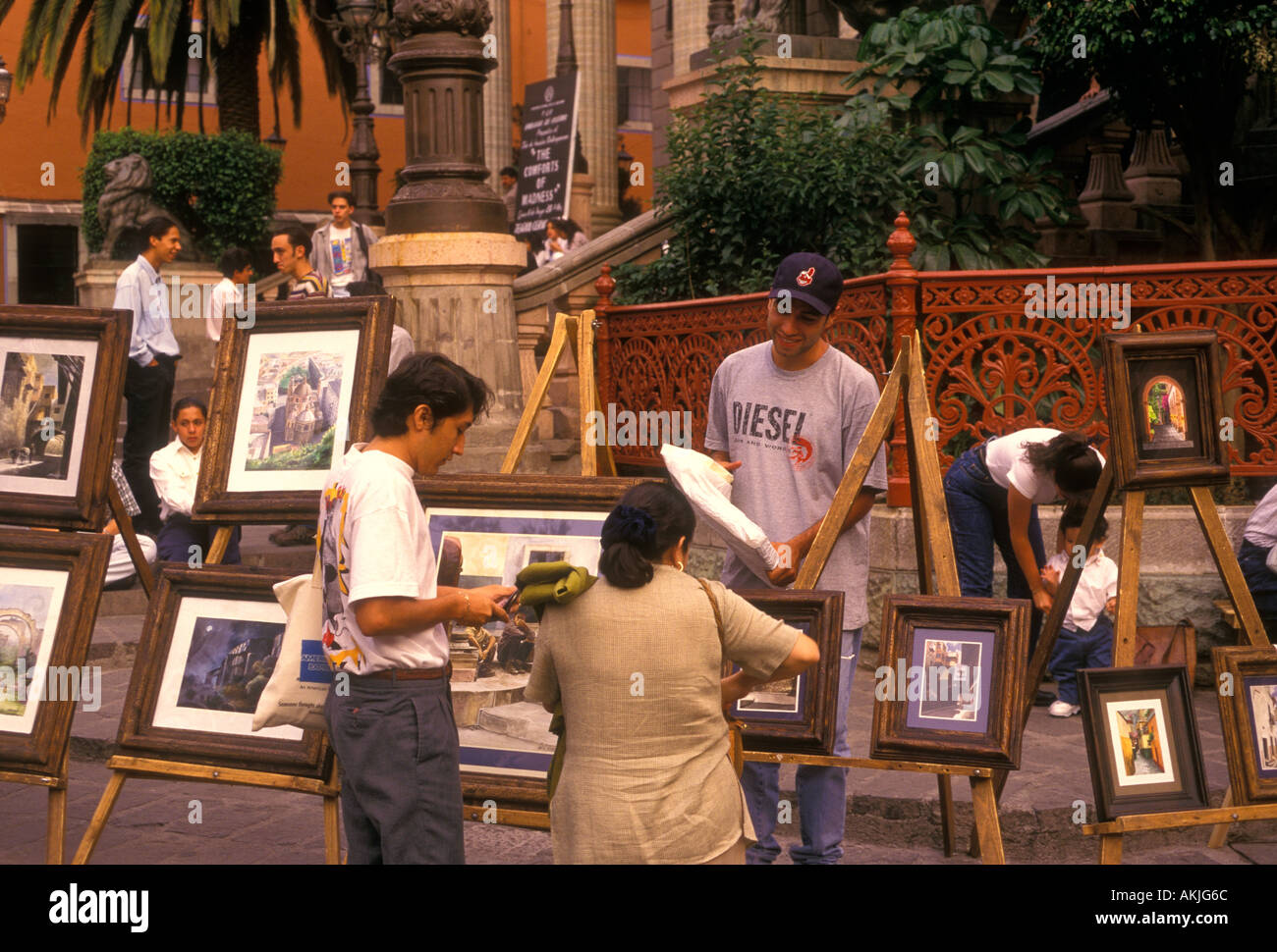 Mexicans, Mexican man, vendor, art fair, selling paintings, paintings ...