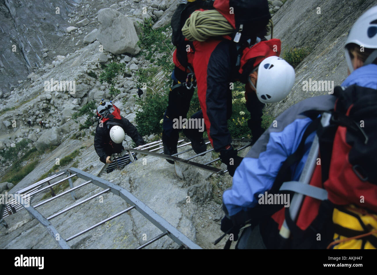 Climbers decend the ladders onto the Mer de Glace Chamonix French Alps ...