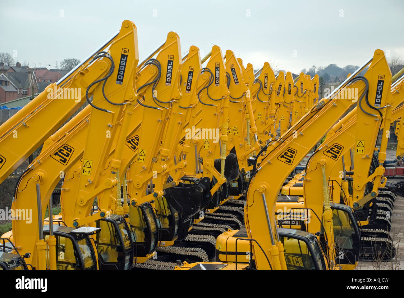 JCB diggers lined up at the JCB factory at Uttoxeter, Staffordshire ...