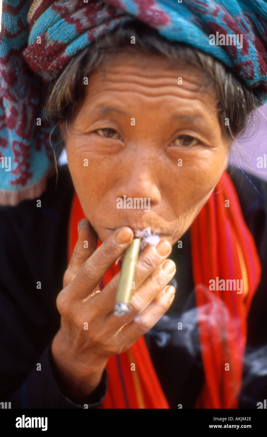 Karen woman smoking cigar Inle Lake Heho Myanmar Burma Stock Photo - Alamy
