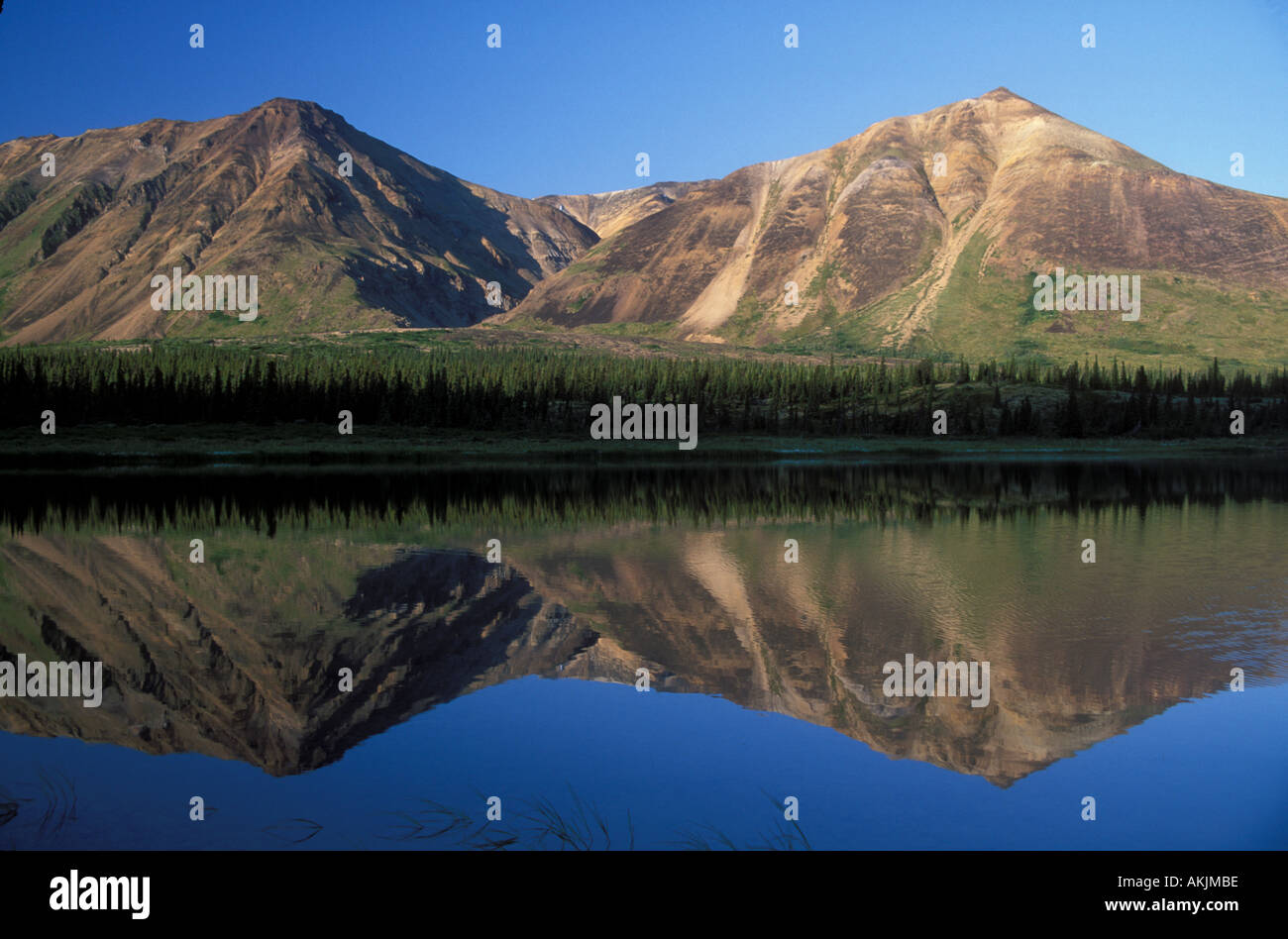 Chigmit Mountains reflection in lower Twin Lake Lake Clark National ...