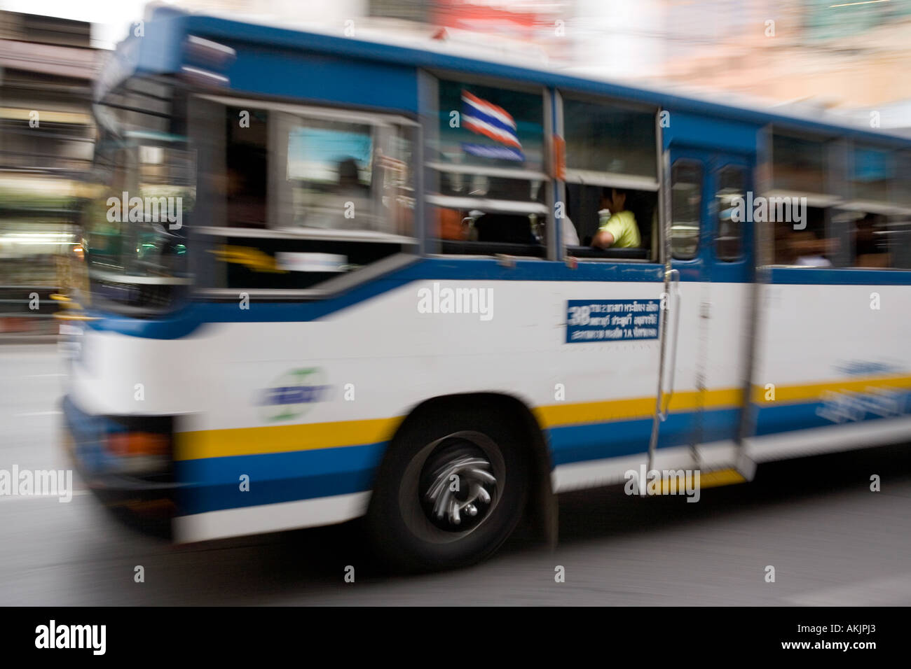 Public transport bus carrying passengers in Bangkok, Thailand Stock ...