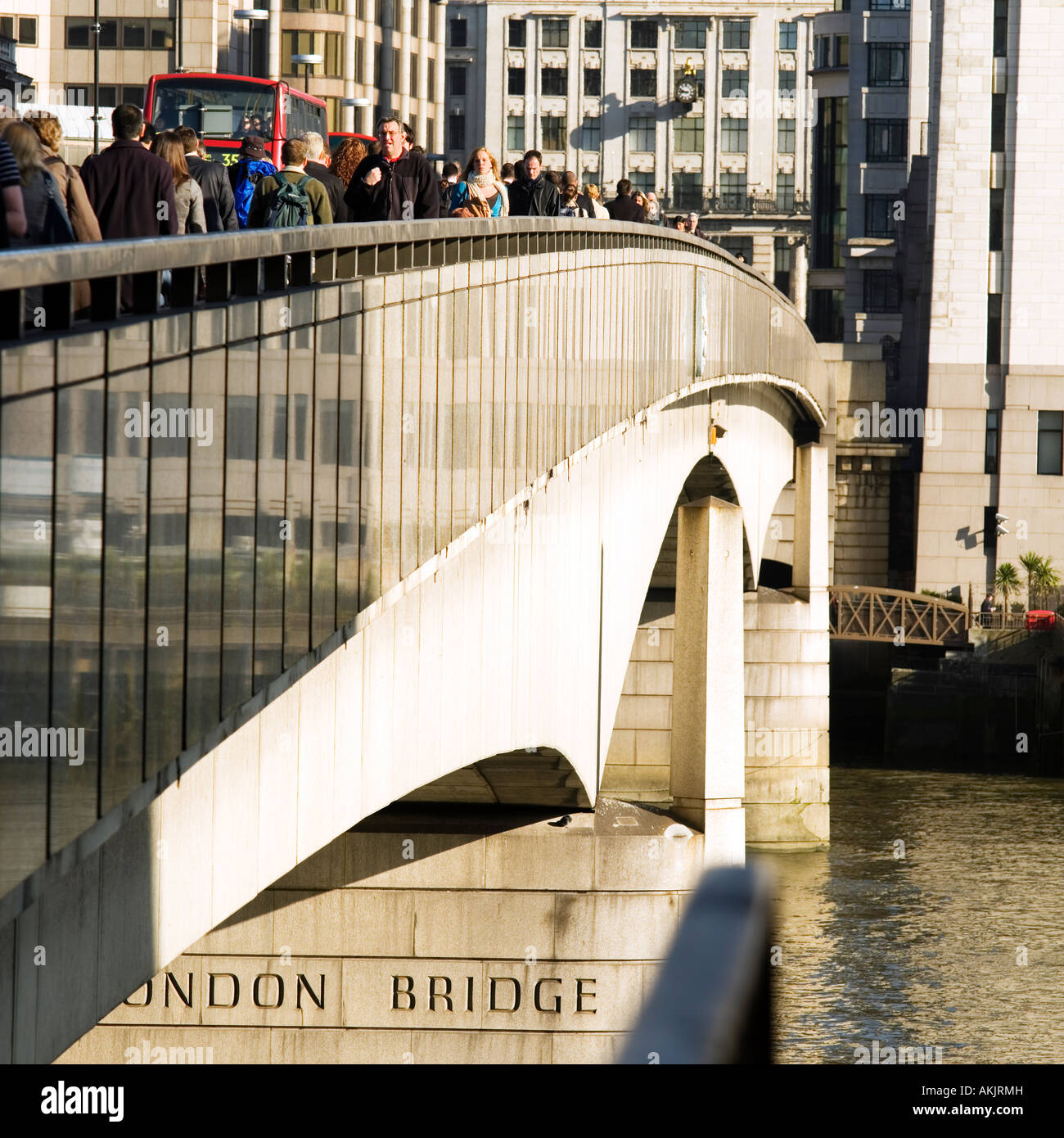 Going to work early morning workers crossing London Bridge No model ...