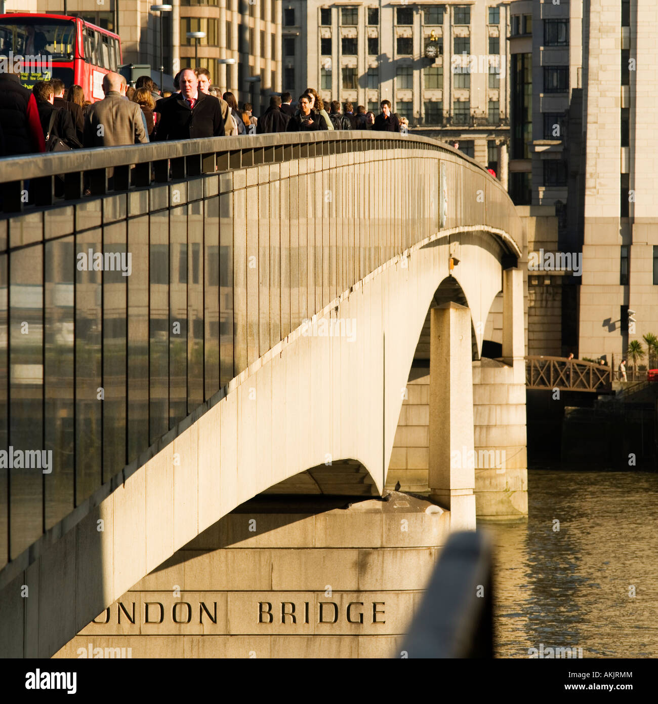 Going to work early morning workers crossing London Bridge Stock Photo ...