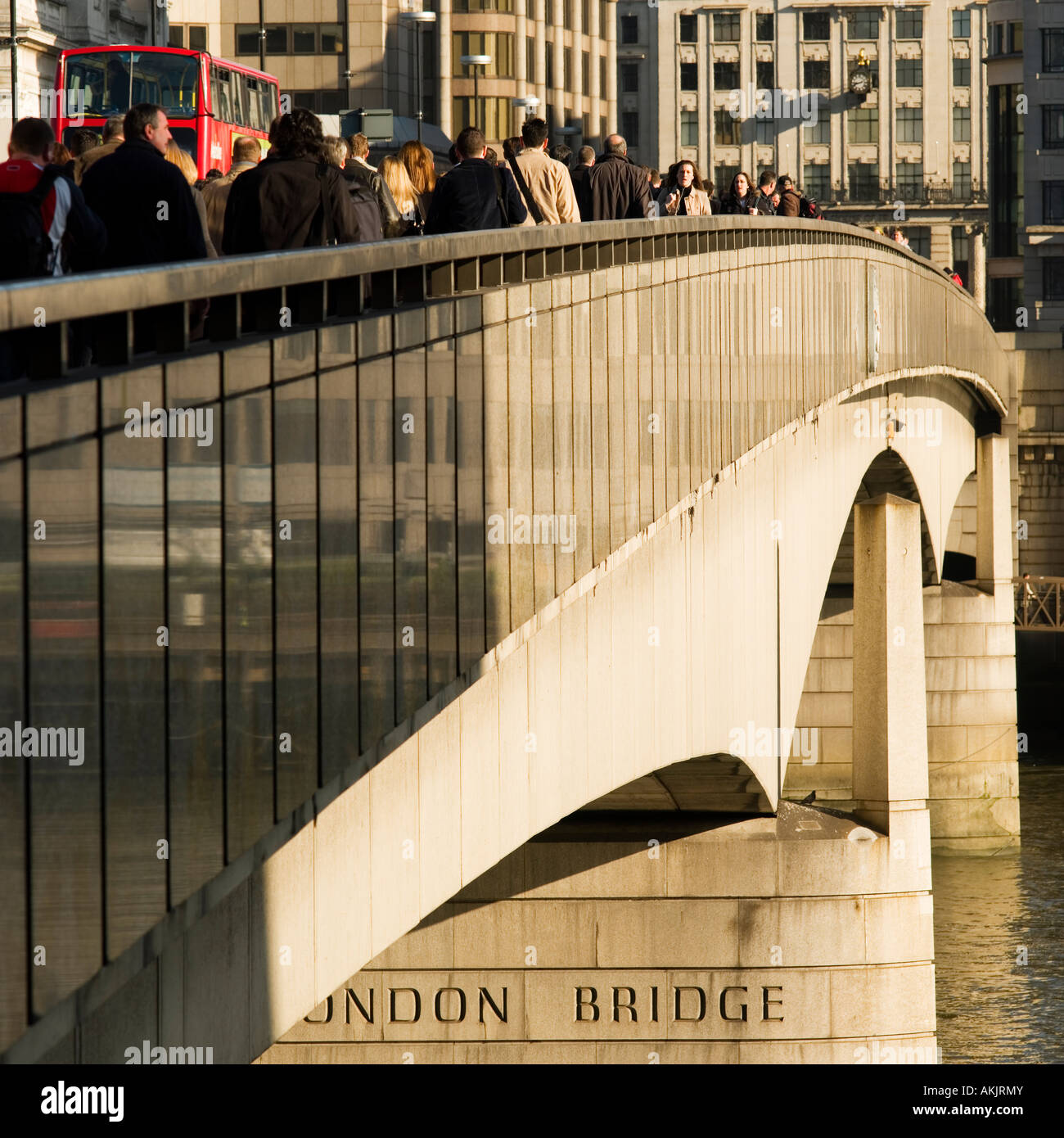 Going to work early morning workers crossing London Bridge No model ...