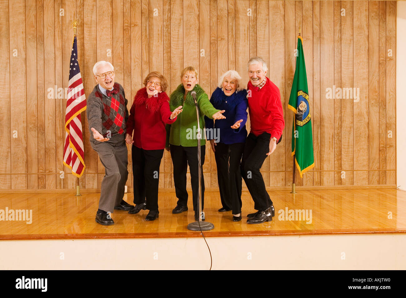 Enthusiastic elderly people singing on stage Stock Photo - Alamy