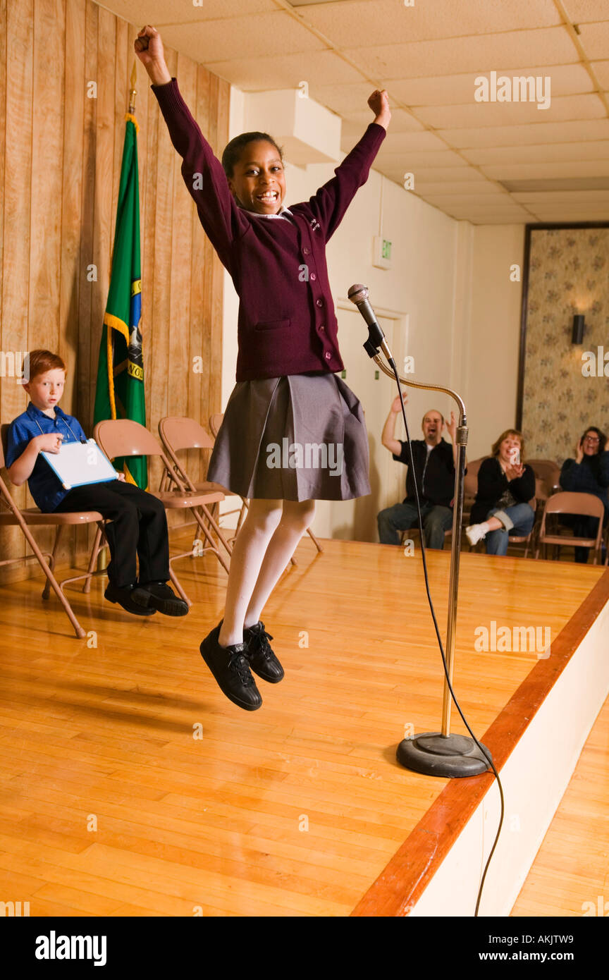 Excited girl winning competition Stock Photo - Alamy
