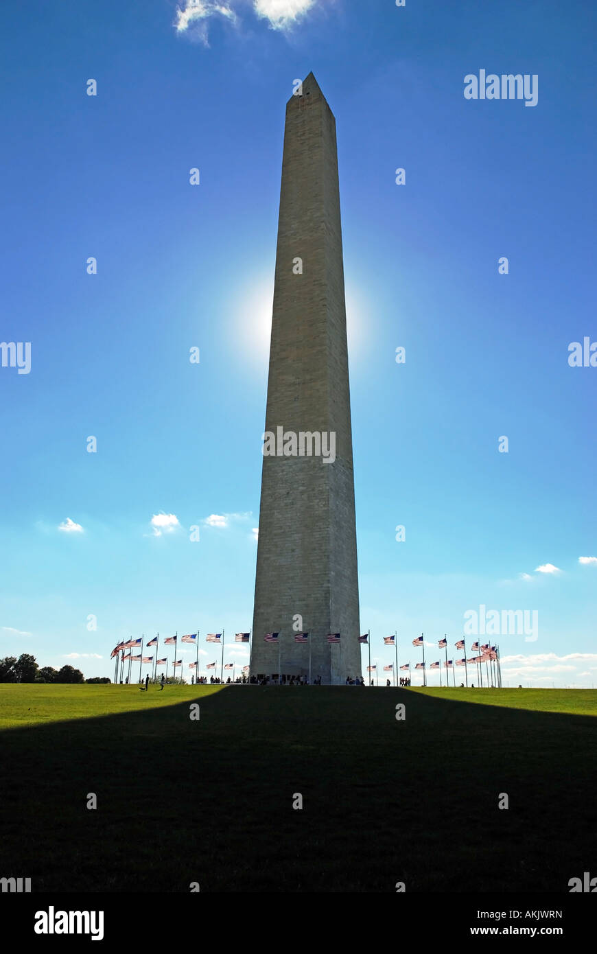 A low sun creating a large shadow from the Washington Monument ...