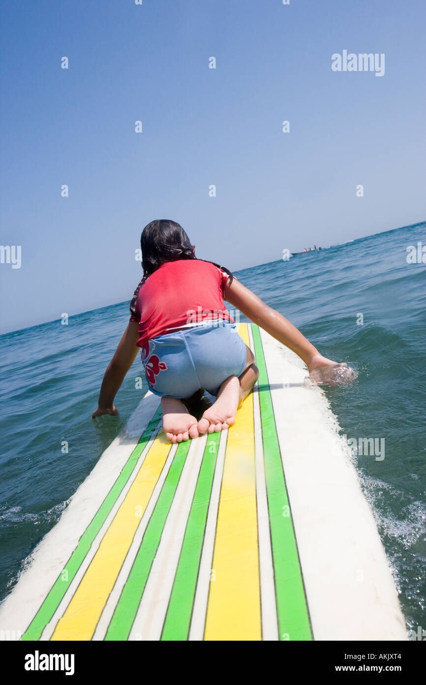 Surfer girl paddling hi-res stock photography and images - Alamy