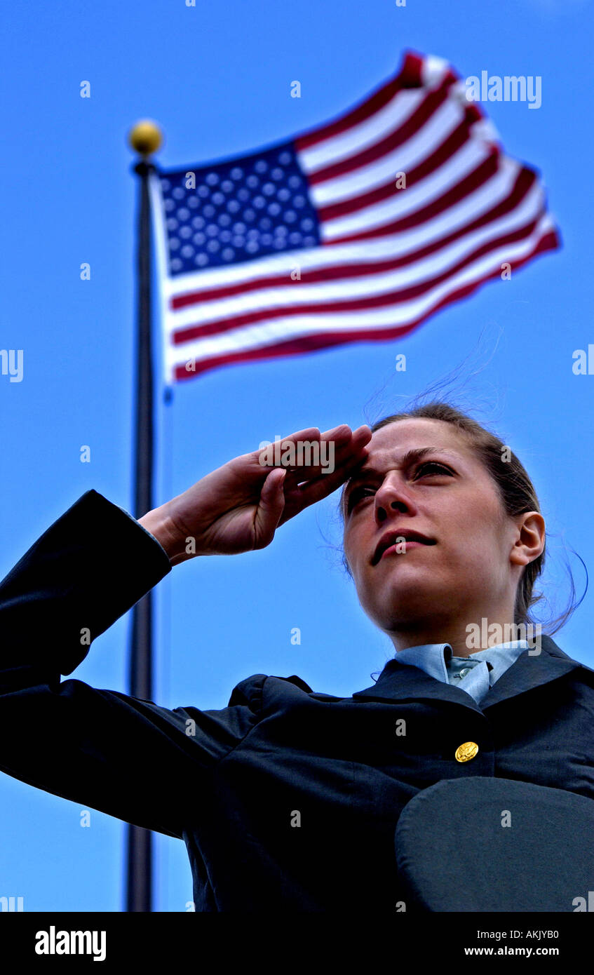 American female soldier saluting flag hi-res stock photography and ...