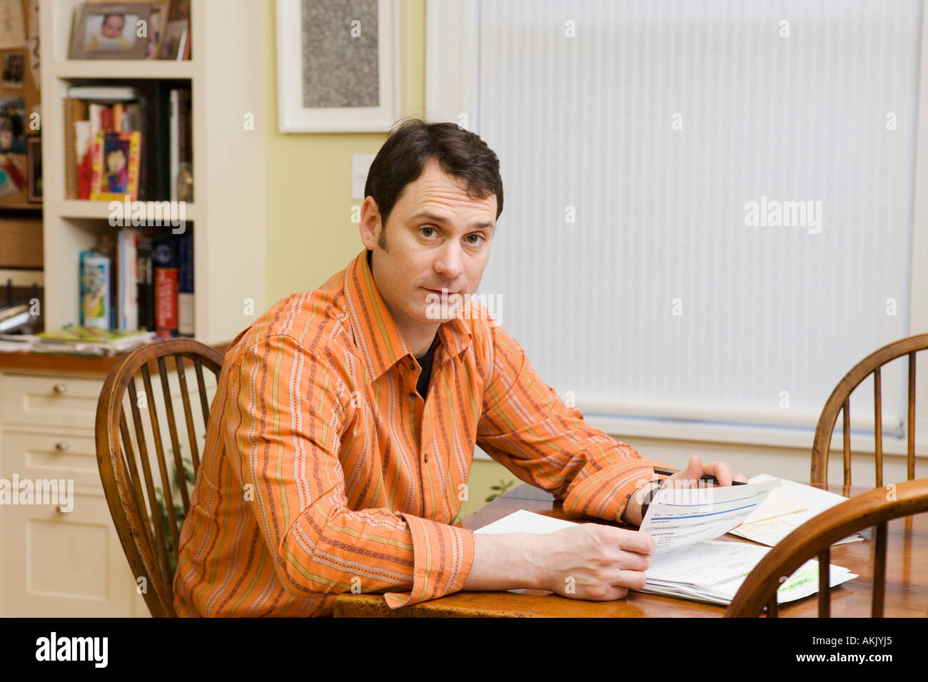 Man stressed doing paper work hi-res stock photography and images - Alamy