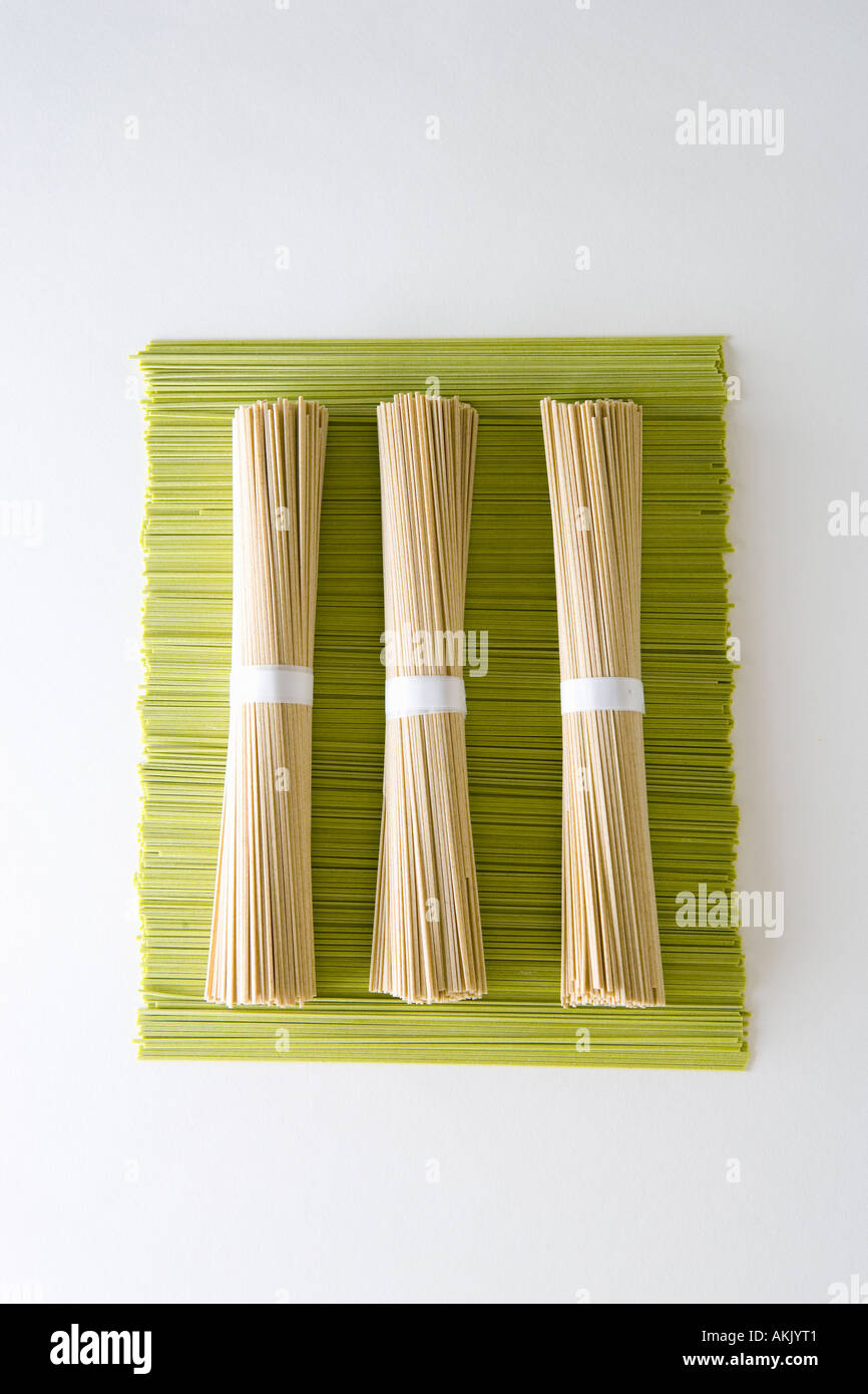 Bundles of soba noodles on green tea noodles Stock Photo - Alamy