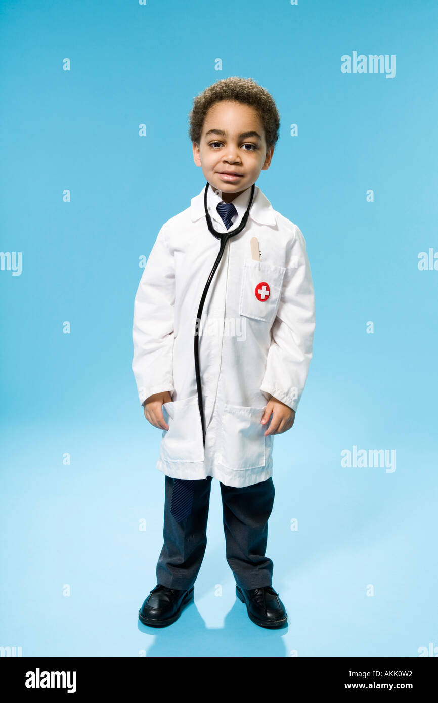 Full length portrait of young boy dressed as doctor Stock Photo - Alamy