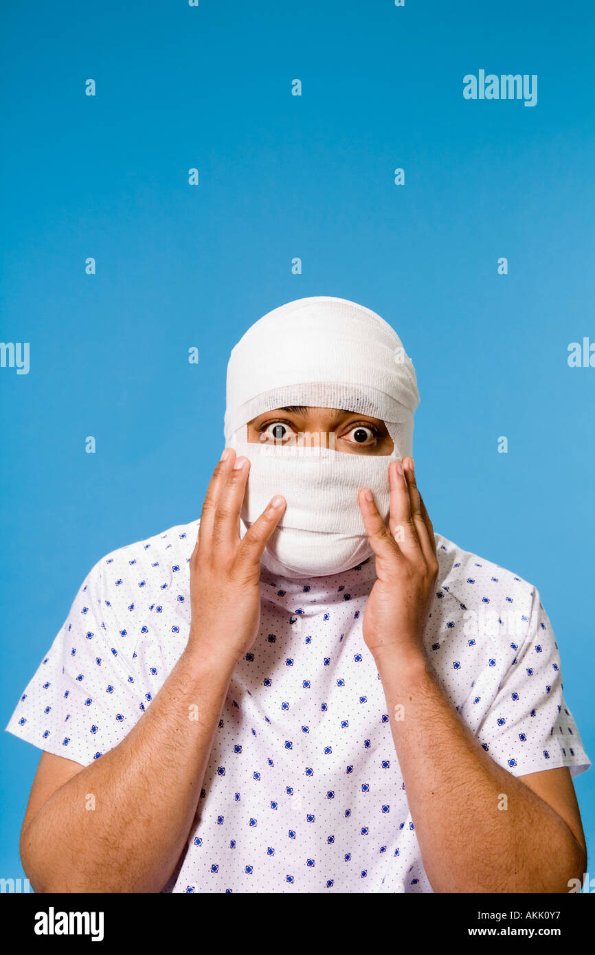 Male patient with bandages on head Stock Photo - Alamy