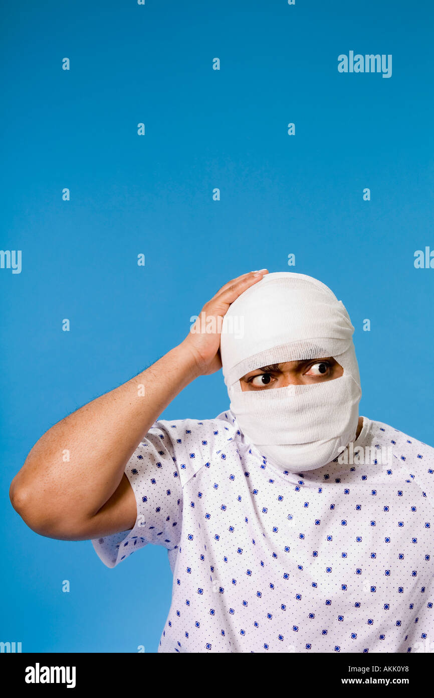 Male patient with bandages on head Stock Photo - Alamy