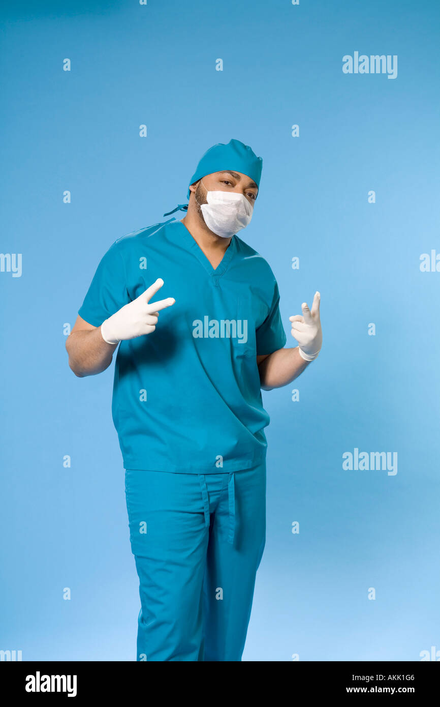 Portrait of doctor wearing scrubs Stock Photo - Alamy