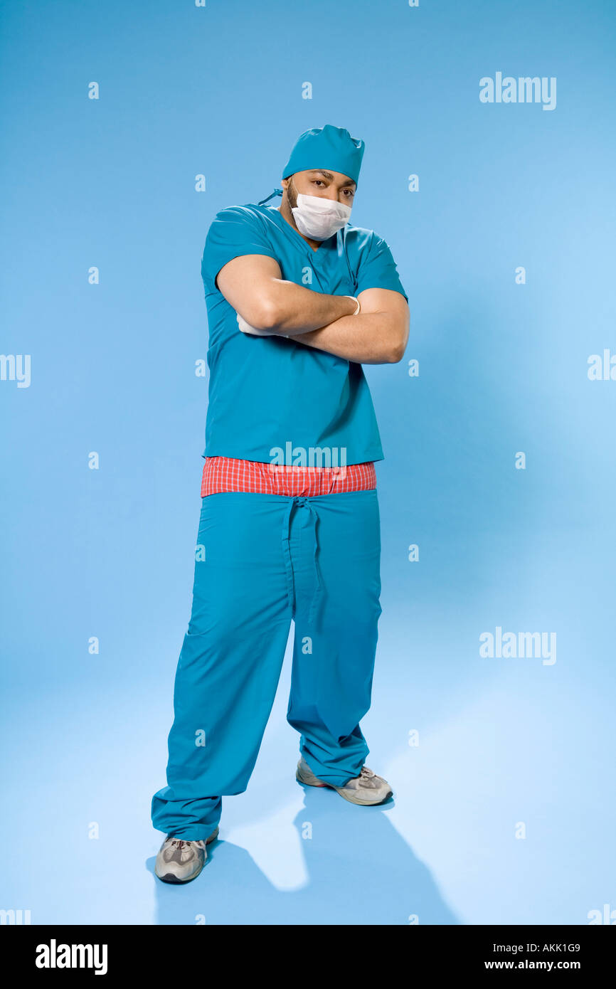 Portrait of doctor wearing scrubs Stock Photo - Alamy